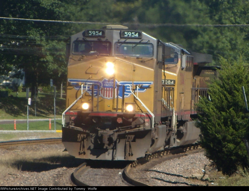 UP 5954 leads and empty coal with UP 7084 trailing